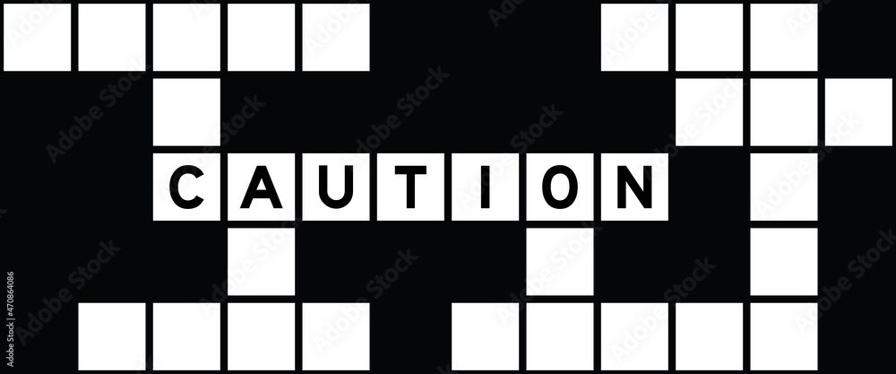 Alphabet letter in word caution on crossword puzzle background Stock ...
