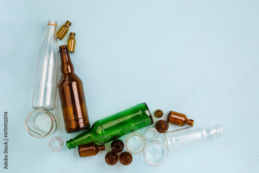 Separate collection of glass garbage. Corner from bottles and cans for ...