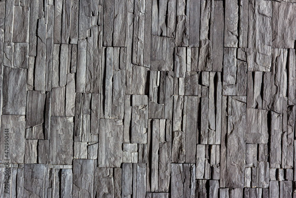 Vertically aligned limestone wall stone blocks. Colorful texture of the ...