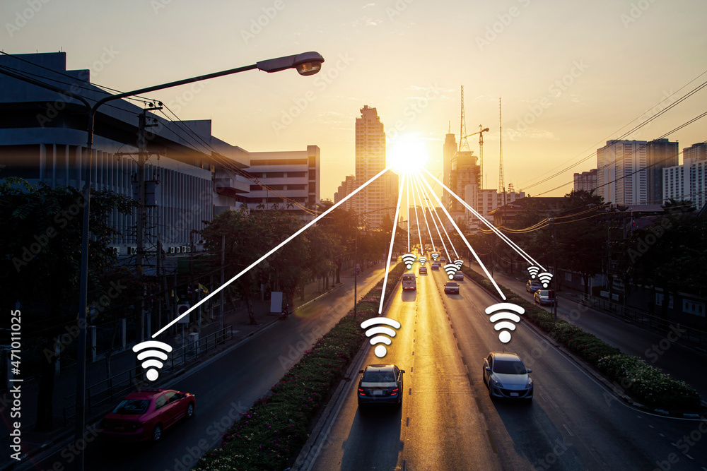 Car on road with wifi signal data link icon in concept of smart city ...