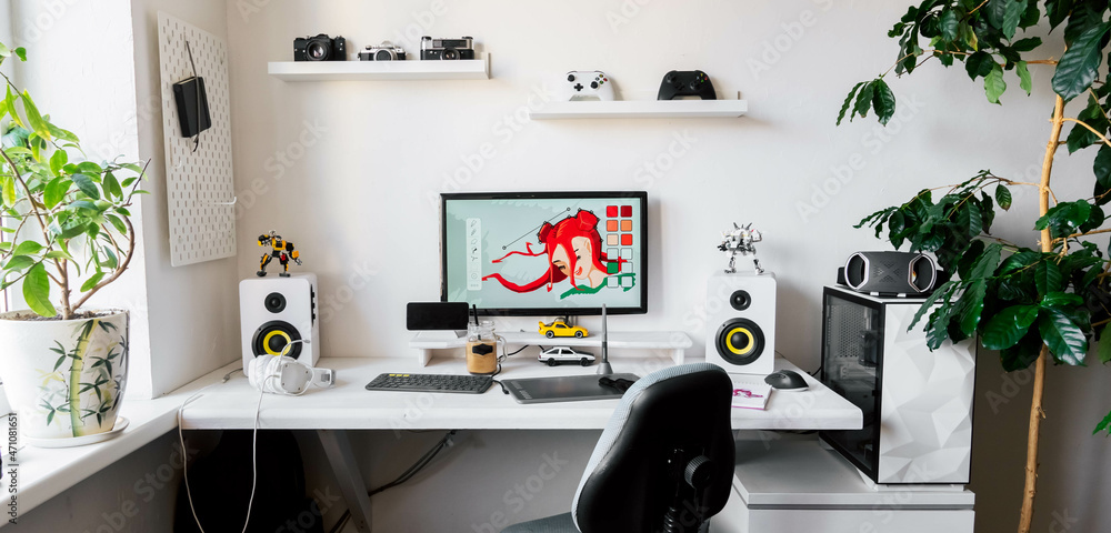 Convenient digital artist workspace with graphic tablet and sketching ...