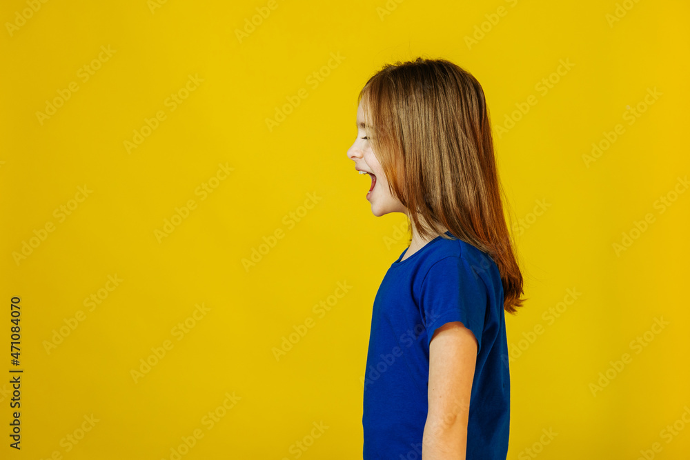 side view of a child shouting Loud. Portrait of shocked, Angry and ...