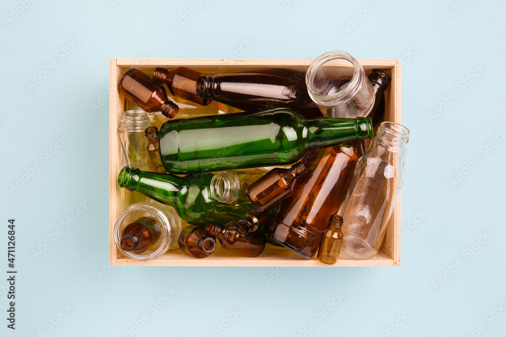 wooden box with Separate collected glass garbage, top view. Glass ...