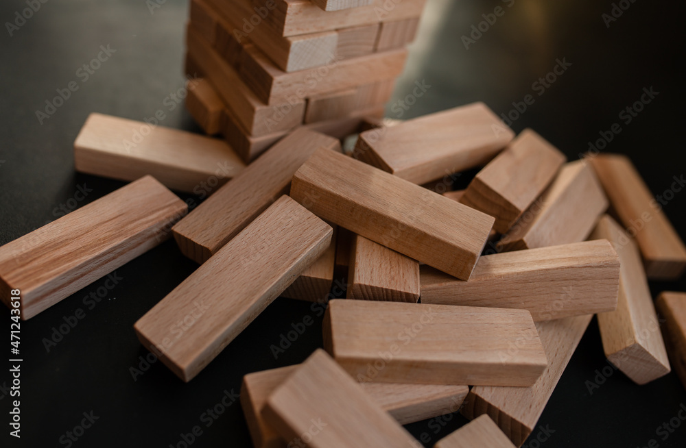 Education, risk, development and growth concept. jenga game. The ...