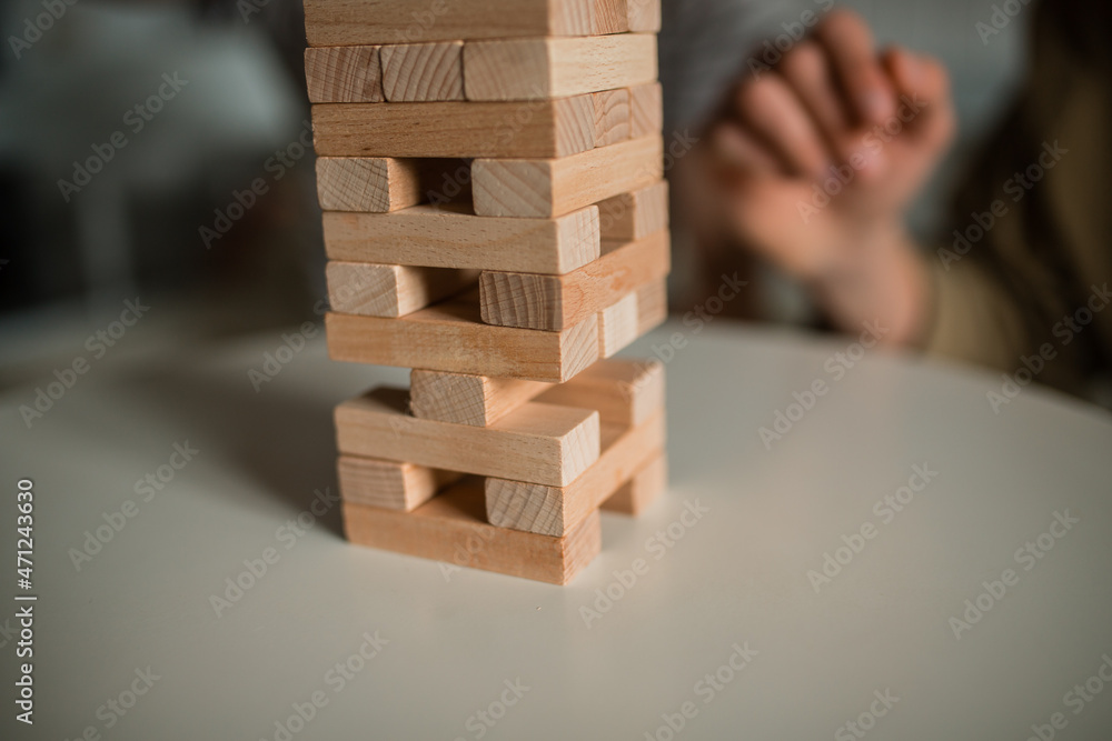 Education, risk, development and growth concept. jenga game. The ...