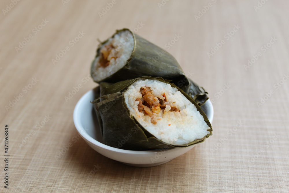 Arem-arem is a traditional snack from Indonesia. Made from sticky rice ...