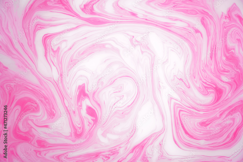 Abstract colored marble background, stains of pink paint on the surface ...