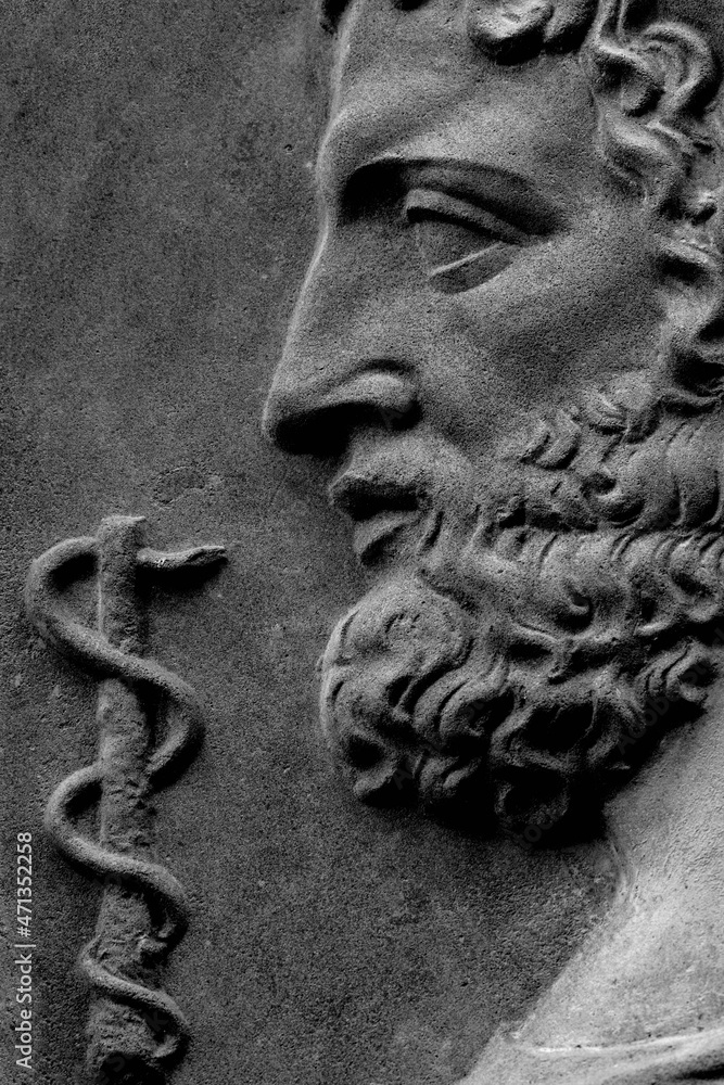 God of treatment Asclepius (Lat. Aesculapius). Fragment of an ancient ... God of treatment Asclepius (Lat. Aesculapius). Fragment of an ancient ...