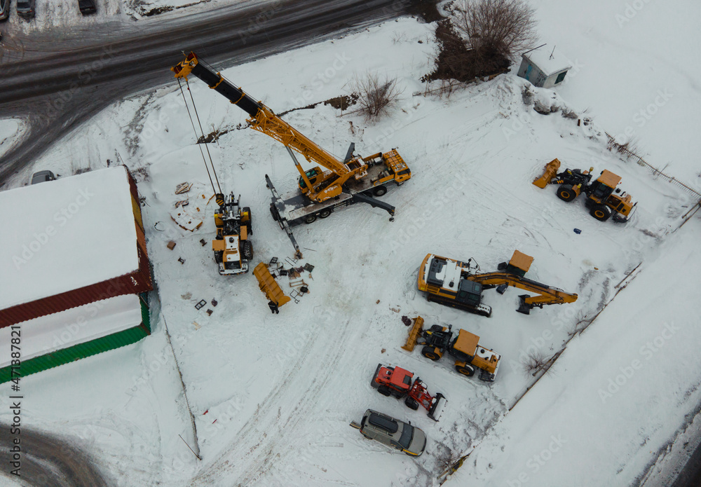 Mobile construction crane with yellow telescopic boom. installation of ...