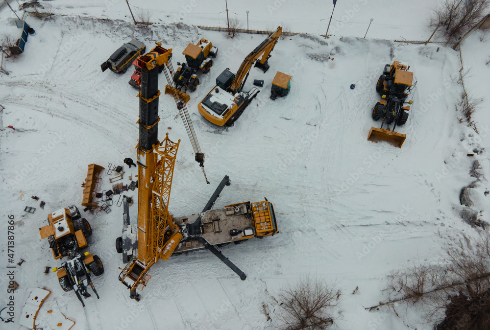 Mobile construction crane with yellow telescopic boom. installation of ...