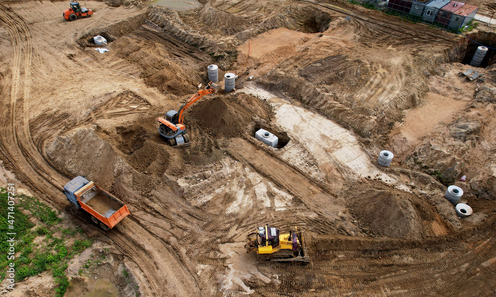 Laying of underground storm sewer pipes and sewerage wells ...