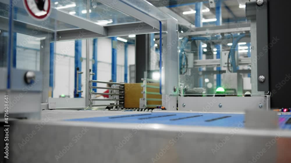 Boxes on conveyor system in factory - automated packaging Stock Video ...