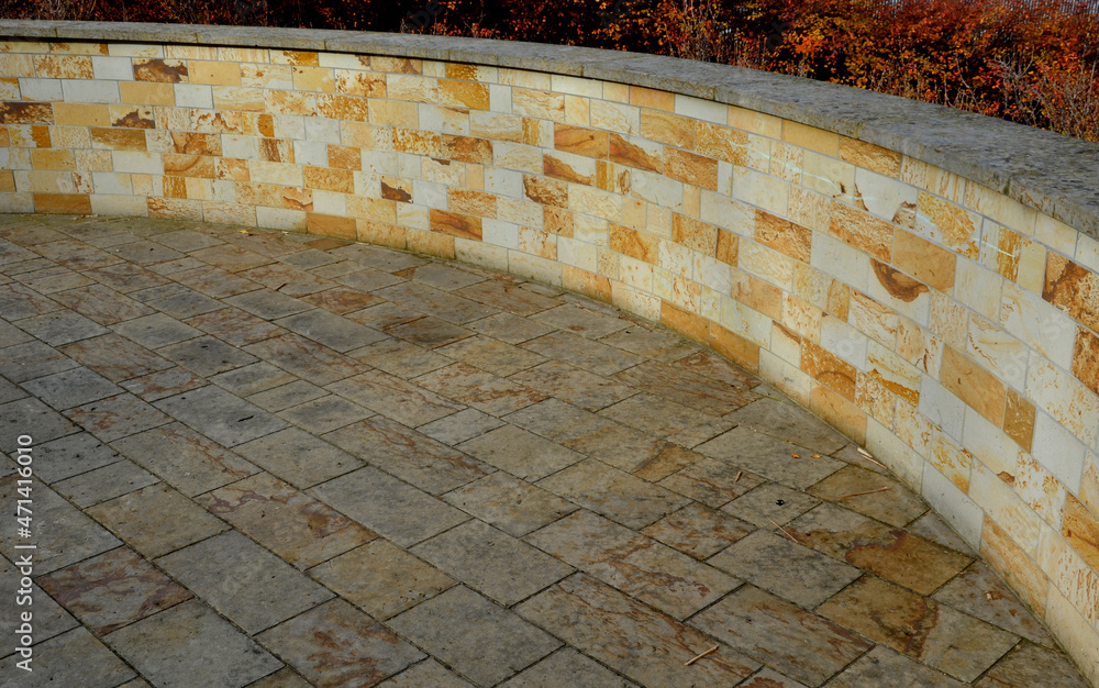 wooden palisade from the poles of the retaining wall of the slope ...