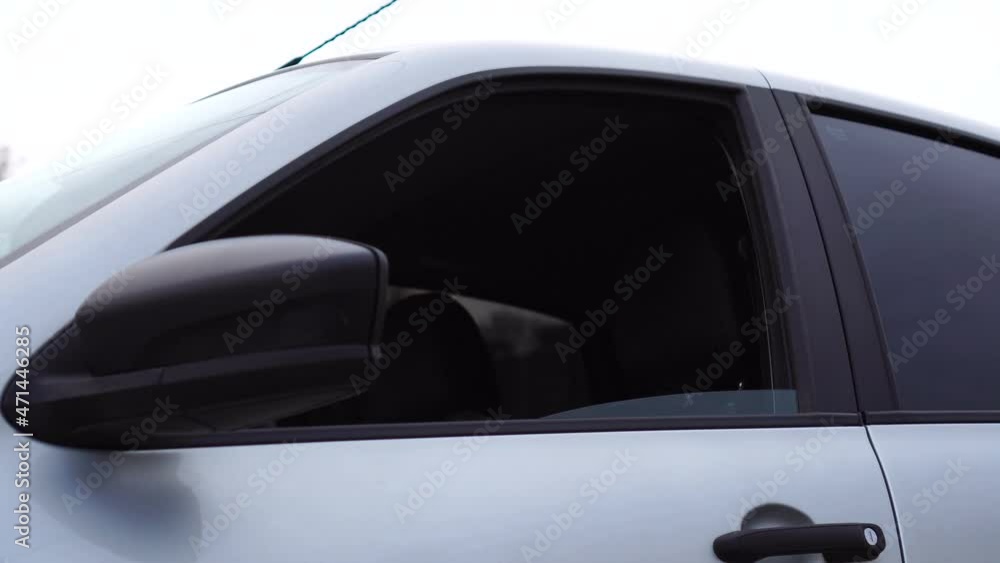 Automatic system of opening and closing glass of car. The window opens ...