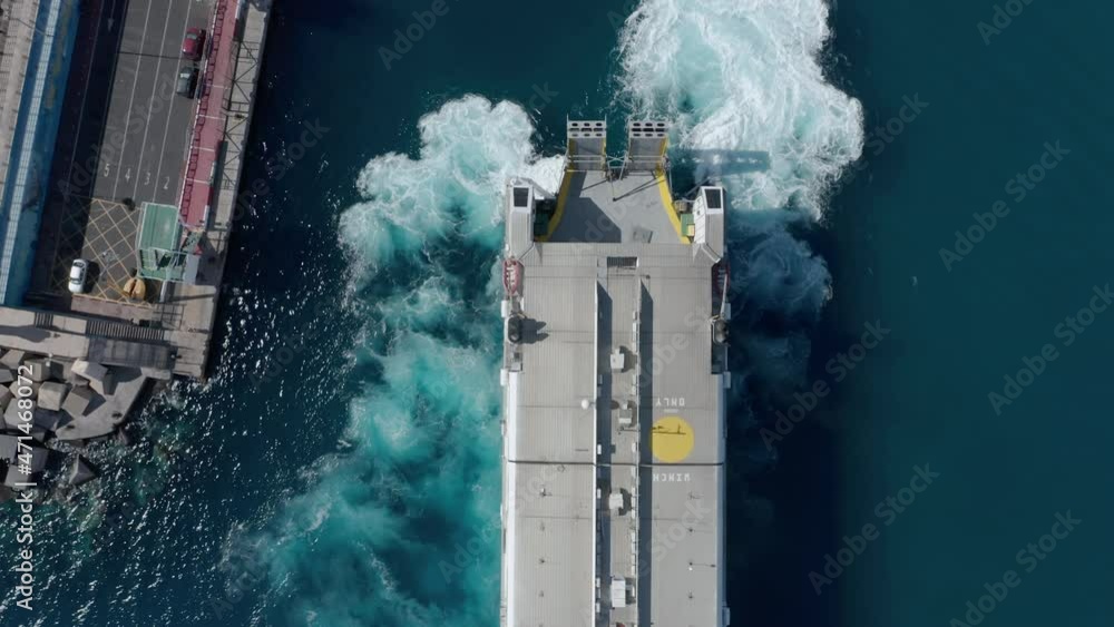 Video Stock Top down aerial view fast ferry docking at port for loading ...