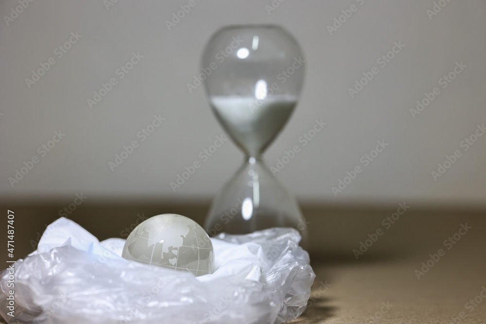 Plastic pollution. Empty plastic bottle, plastic bag and wolrd globe ...