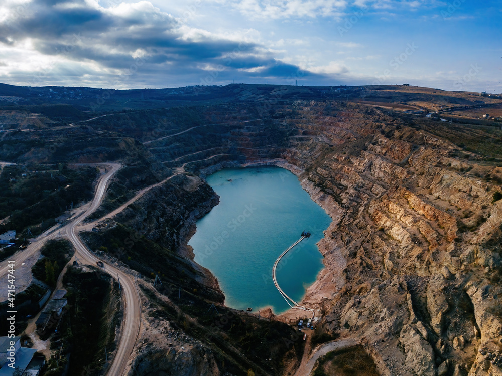Abandoned limestone quarry with lake at the bottom Stock Photo | Adobe ...