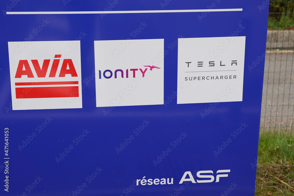 Ionity Tesla avia logo brand and text sign on charger station point of ...