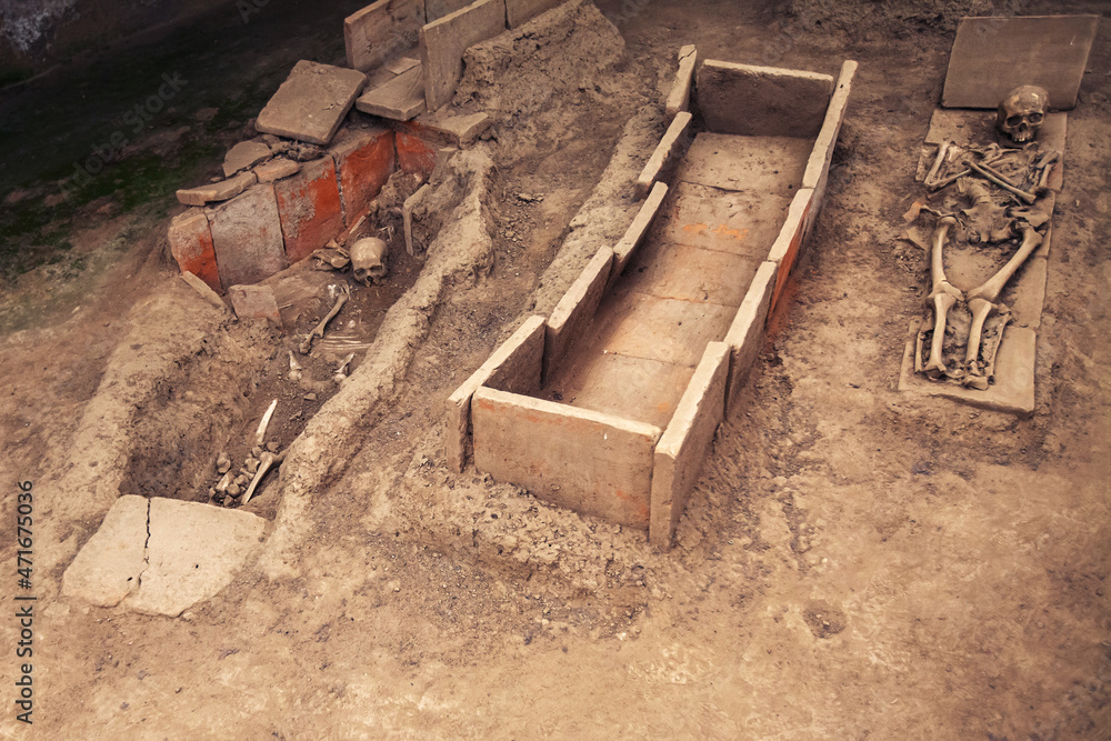 Remains of a human skeleton at in ancient tomb an archeological site ...