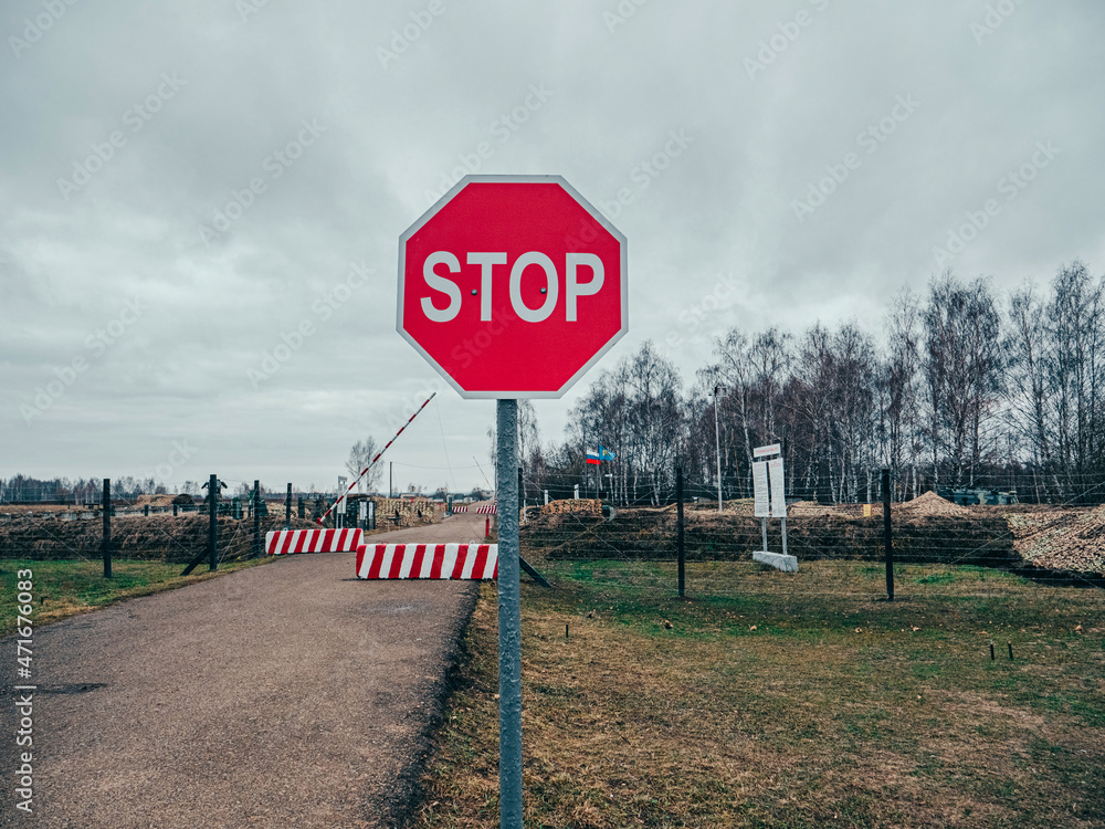Road checkpoint with STOP sign. Peacekeeping Force Post. Blocking the ...