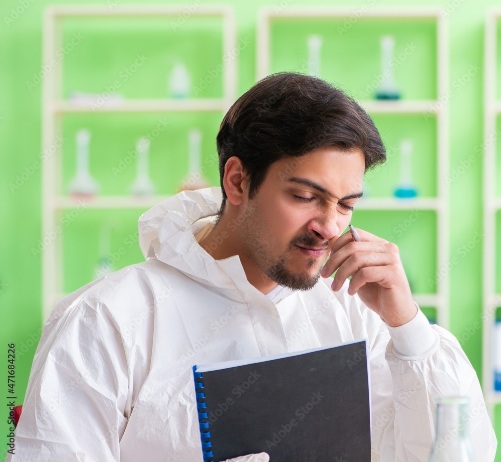 Chemist working in the lab on new experiment Stock Photo | Adobe Stock