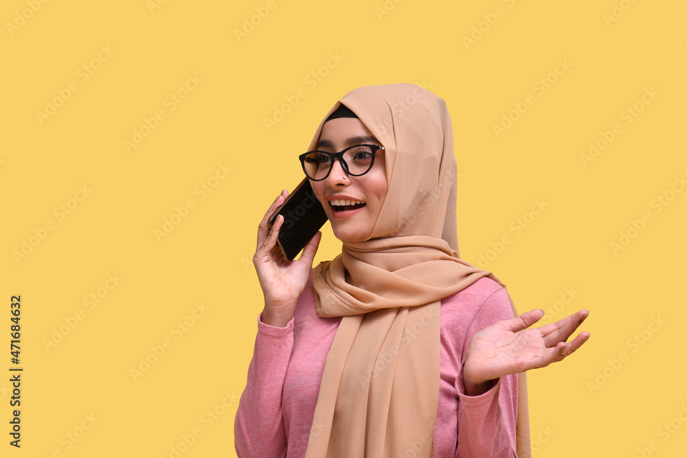 muslim girl wearing hijab having pleasent phone conversation indian ...