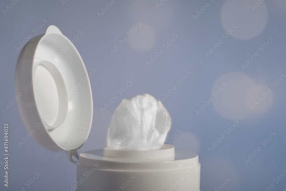 plastic tube with wet wipes for wiping dust from the monitor screen ...