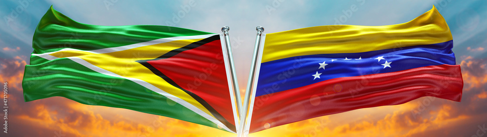 Guyana flag and Venezuela Flag waving with texture sky Cloud and sunset ...
