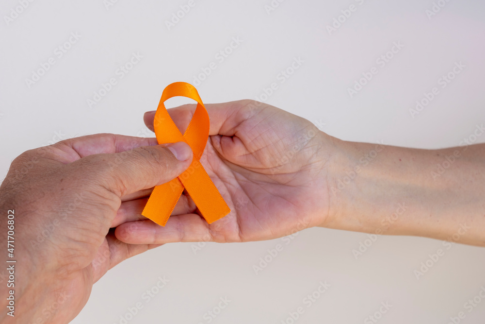 Foto de campaign to prevent skin cancer, melanoma, December orange. man ...