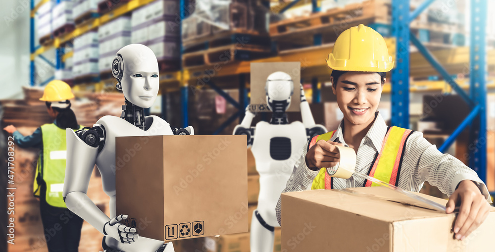 Innovative industry robot working in warehouse together with human ...