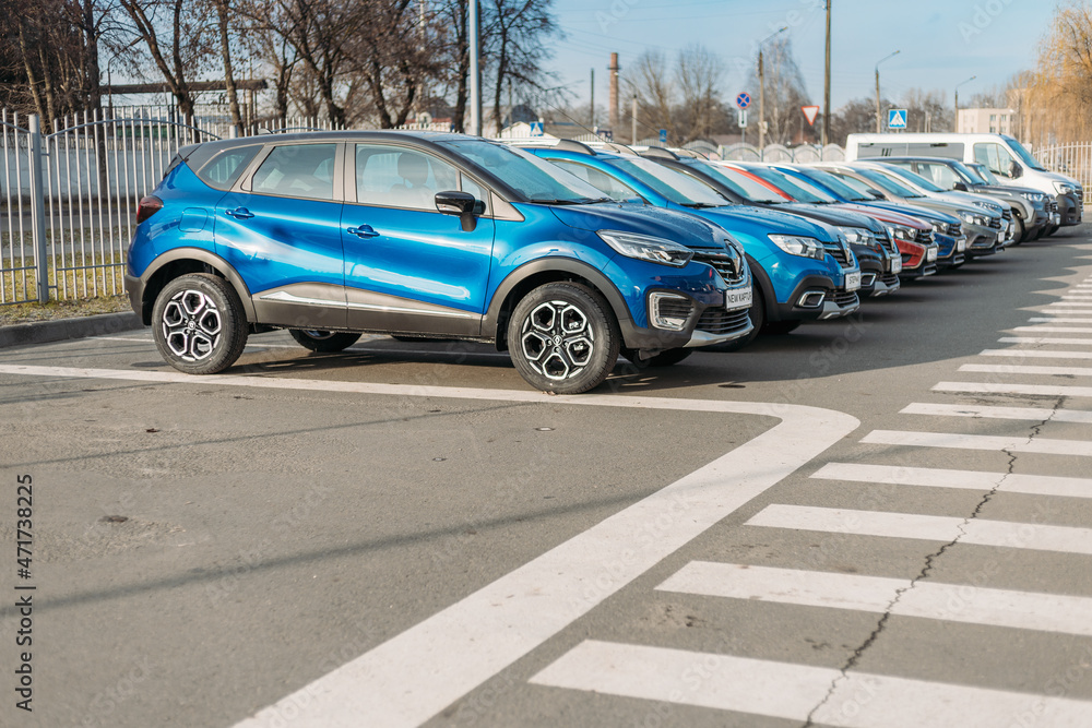 Different Renault Cars parking in row outdoors. Subcompact Crossovers ...