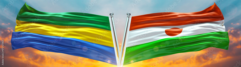 Gabon flag and Niger Flag waving with texture sky Cloud and sunset ...