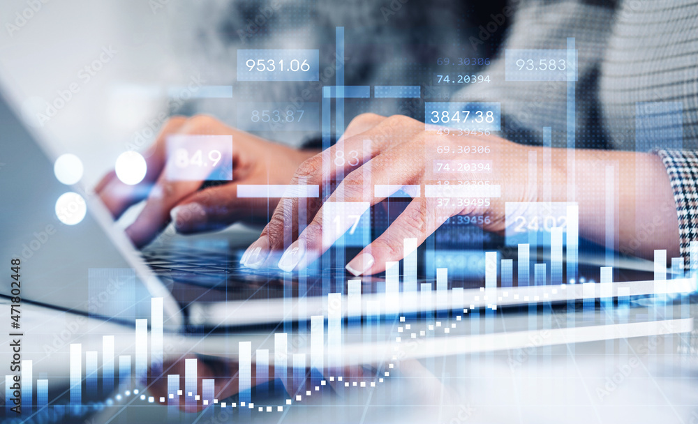 Office woman hands working with laptop, chart with numbers and lines ...