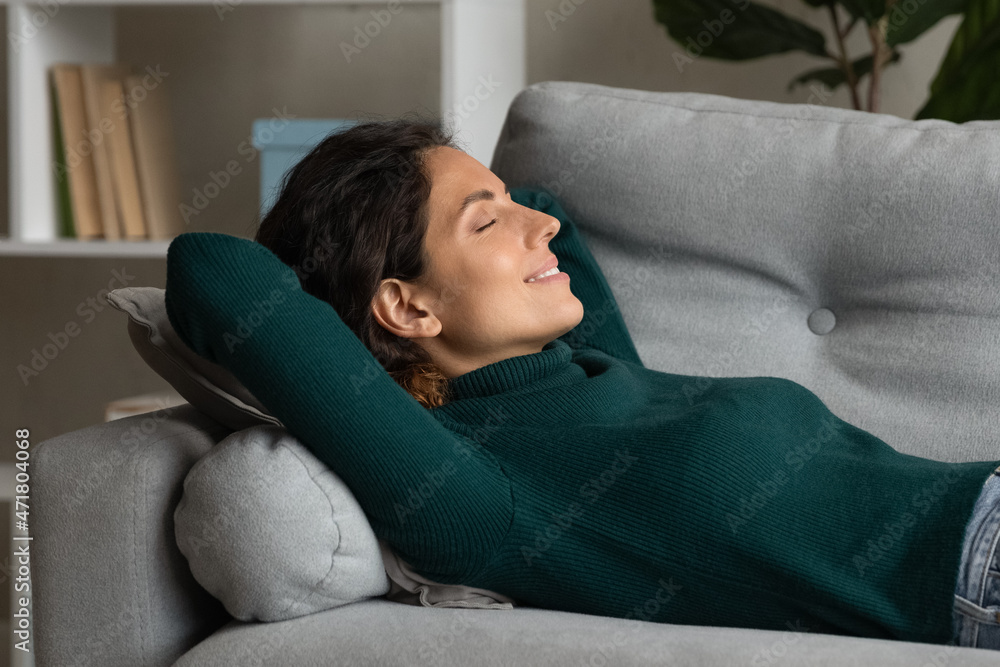 Nap time. Serene millennial hispanic female dreaming sleeping on cozy ...