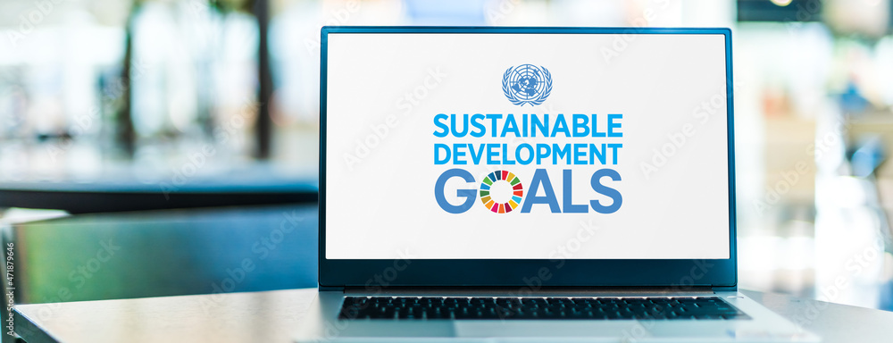 Laptop displaying logo of The Sustainable Development Goals Stock Photo ...