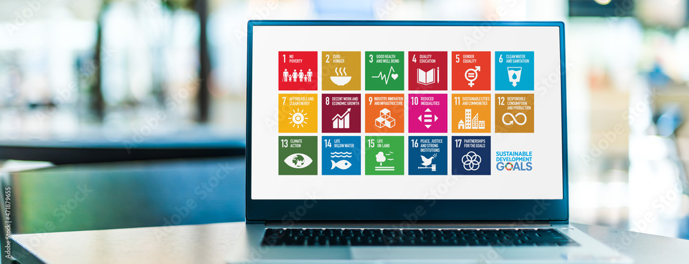 Laptop displaying logo of The Sustainable Development Goals Stock Photo ...