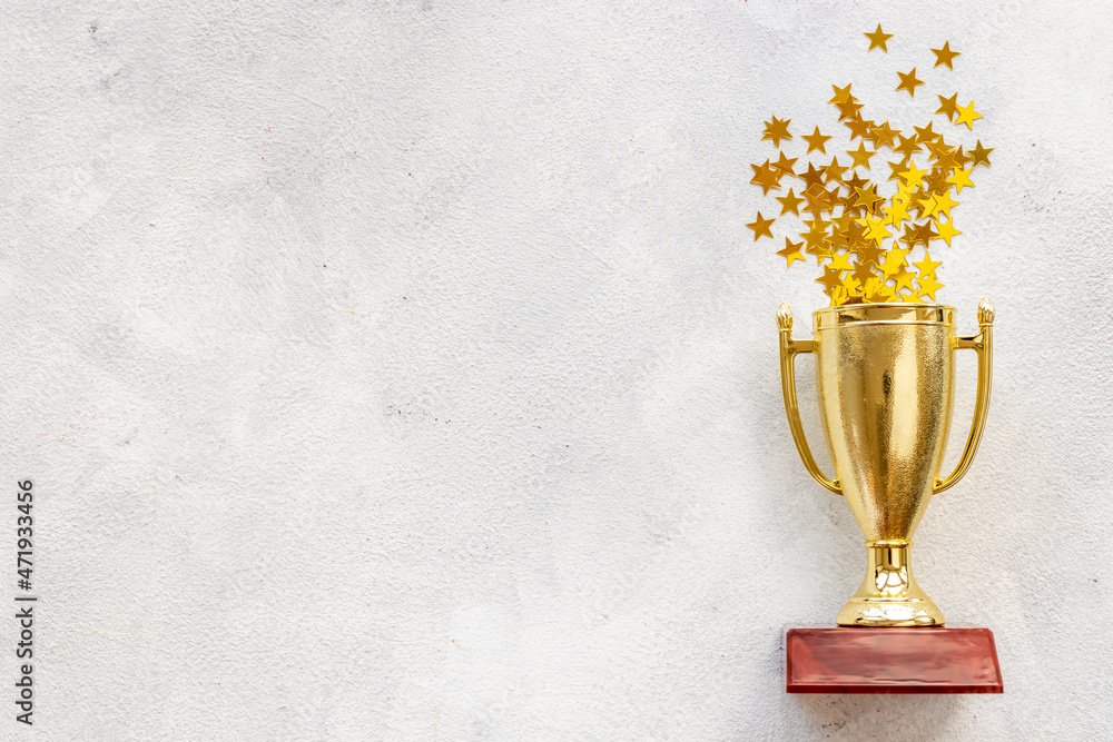 Victory concept with winner golden trophy cup and shiny stars Stock ...