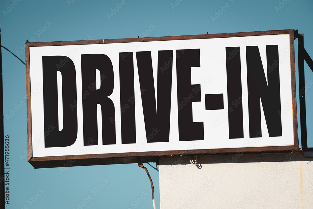 Old aged drive-in movies sign Stock Photo | Adobe Stock