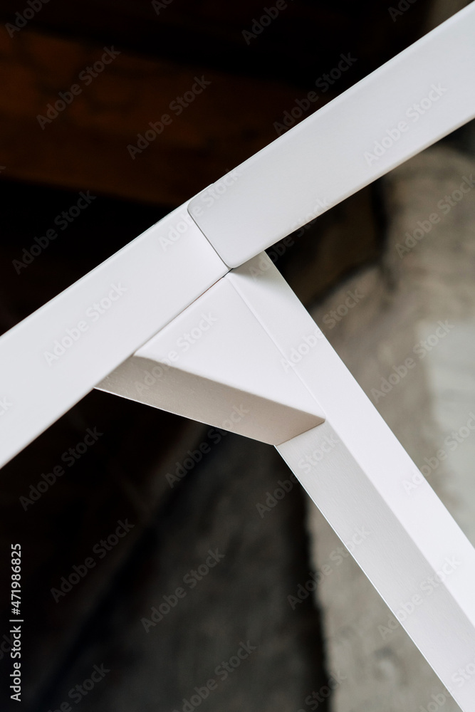 The image of the child's bed, plank joints, details against the ...
