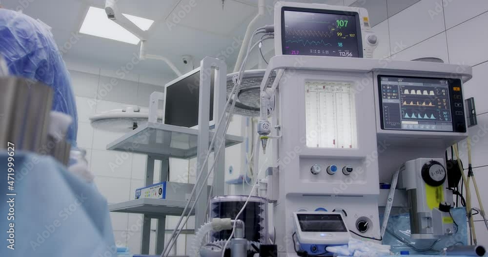 Artificial lung ventilation device. A heart monitor in the clinic ...