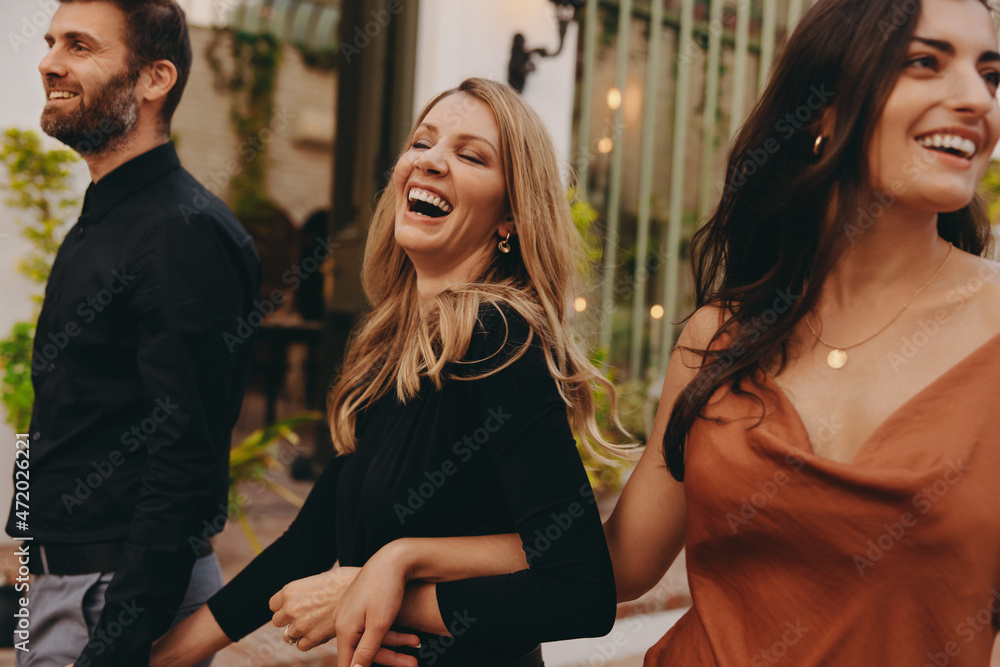 Happy group of friends arriving at a luxury hotel Stock Photo | Adobe Stock