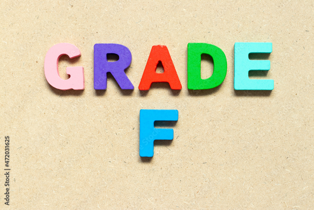Color alphabet letter with word grade F on wood background Stock Photo ...