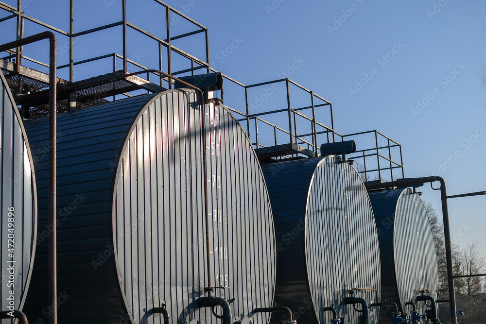 Big overground storage tanks for bitumen. Bitumen is a residual ...