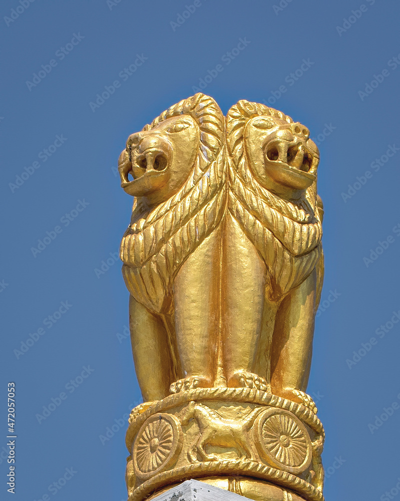 Golden color national emblem of India consisting 4 asiatic lions ...