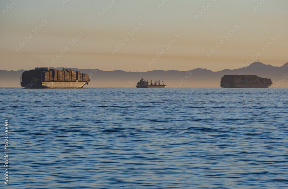 Cargo and container ships anchored at the Port of Long Beach, waiting ...