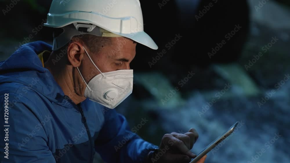 Engineer worker checking water quality of river. Wastewater treatment ...