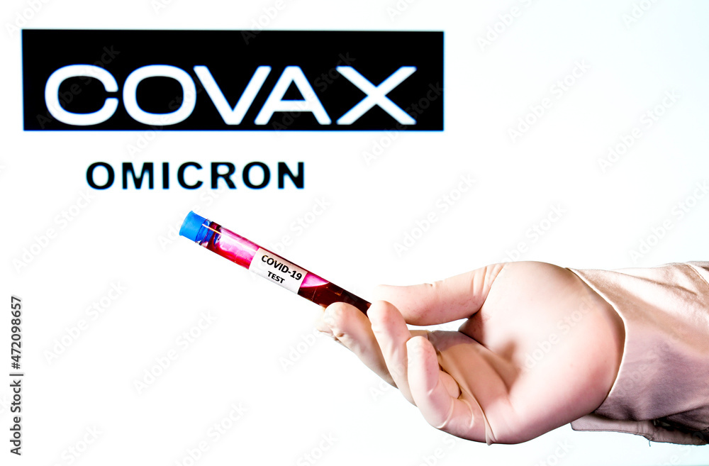 Hand holding test tube of covid-19 virus Stock Photo | Adobe Stock