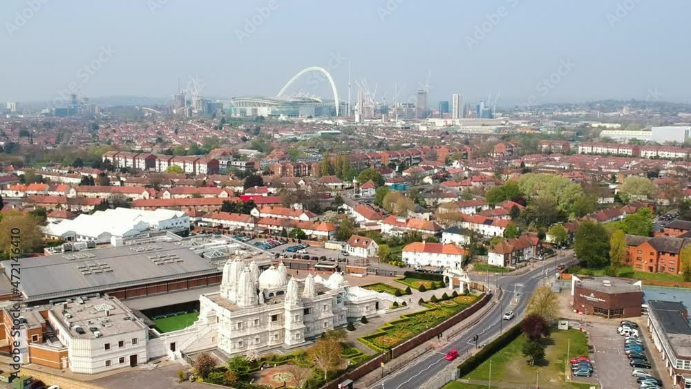 Neasden Temple in Brent, London with Wembley Stadium. BAPS Shri ...
