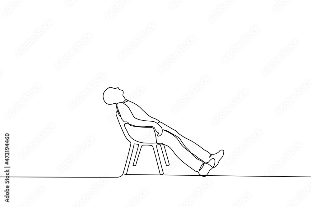 man sits on chair stretching his body in straight line and face ...