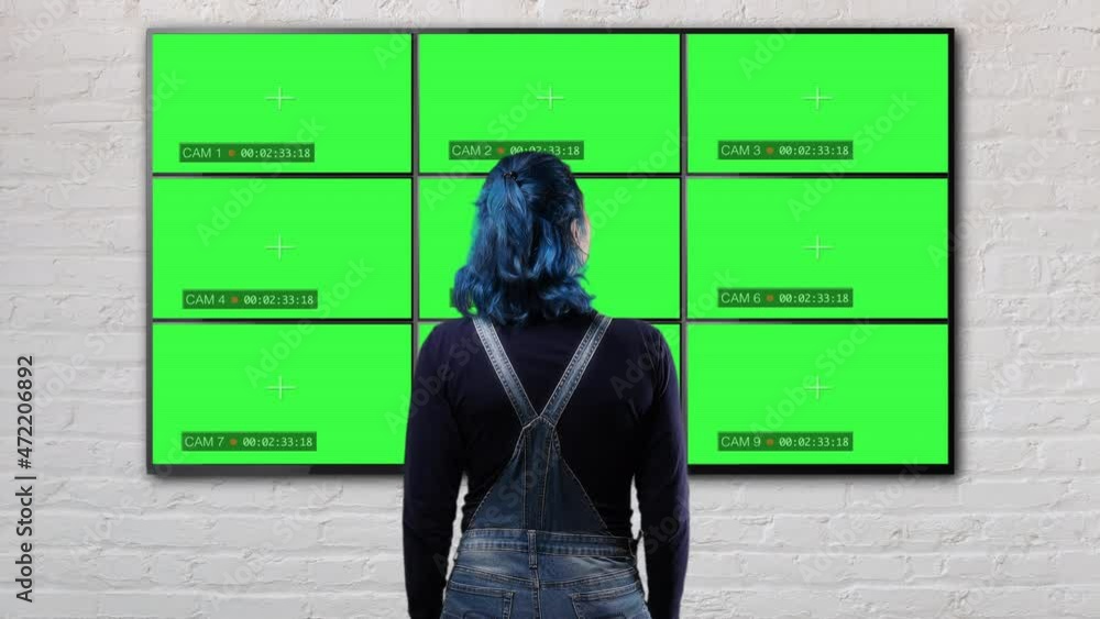 Woman Watching CCTV Monitors Surveillance System Green Screen TV Split ...